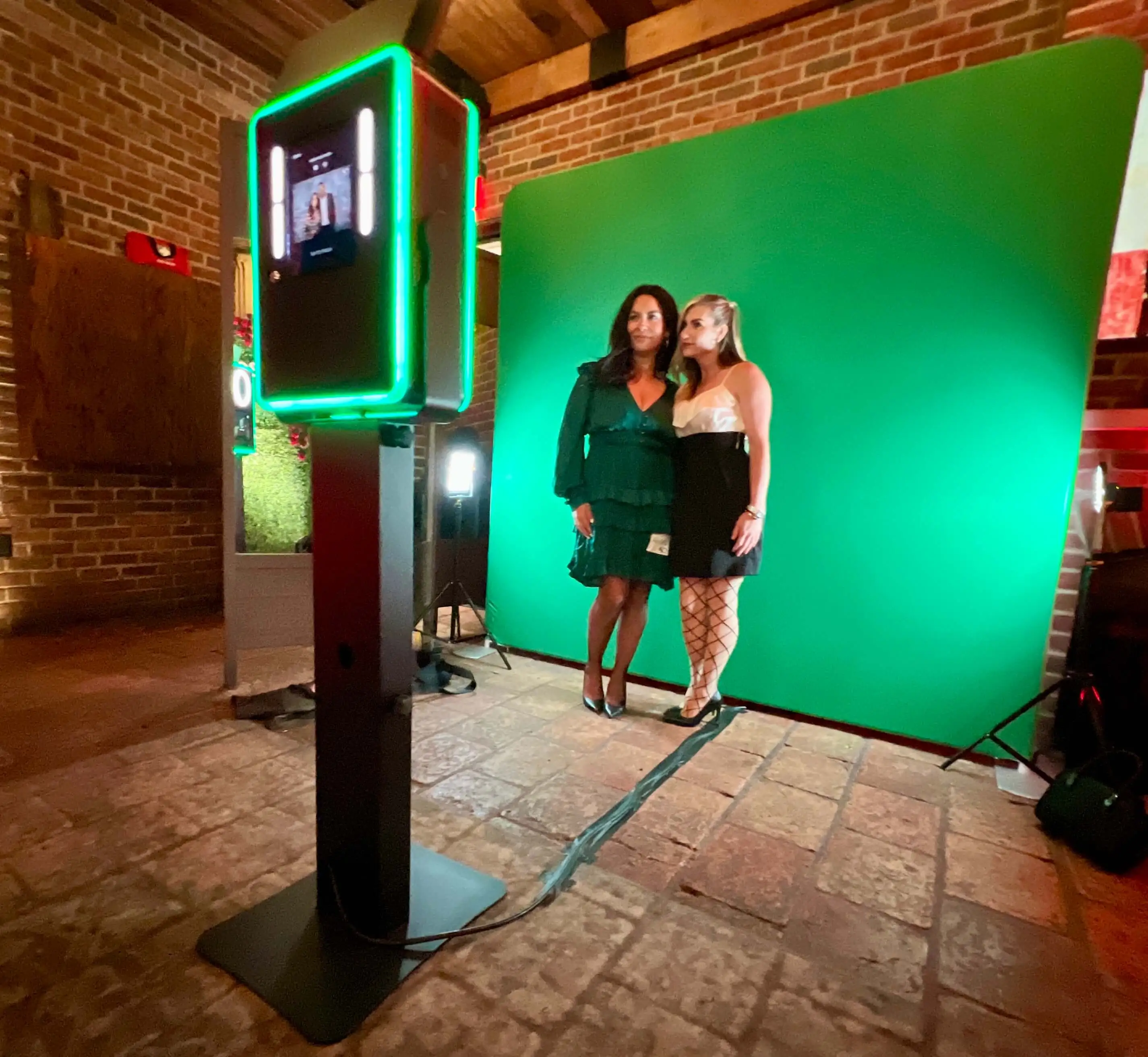 Green Screen Photo Booth - Instantly place your guests in front of a selection of custom digital ...